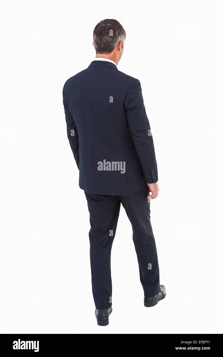 Rear view of a businessman posing Stock Photo - Alamy