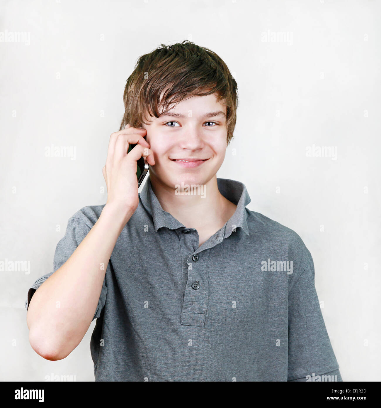 Boy at phone Stock Photo - Alamy