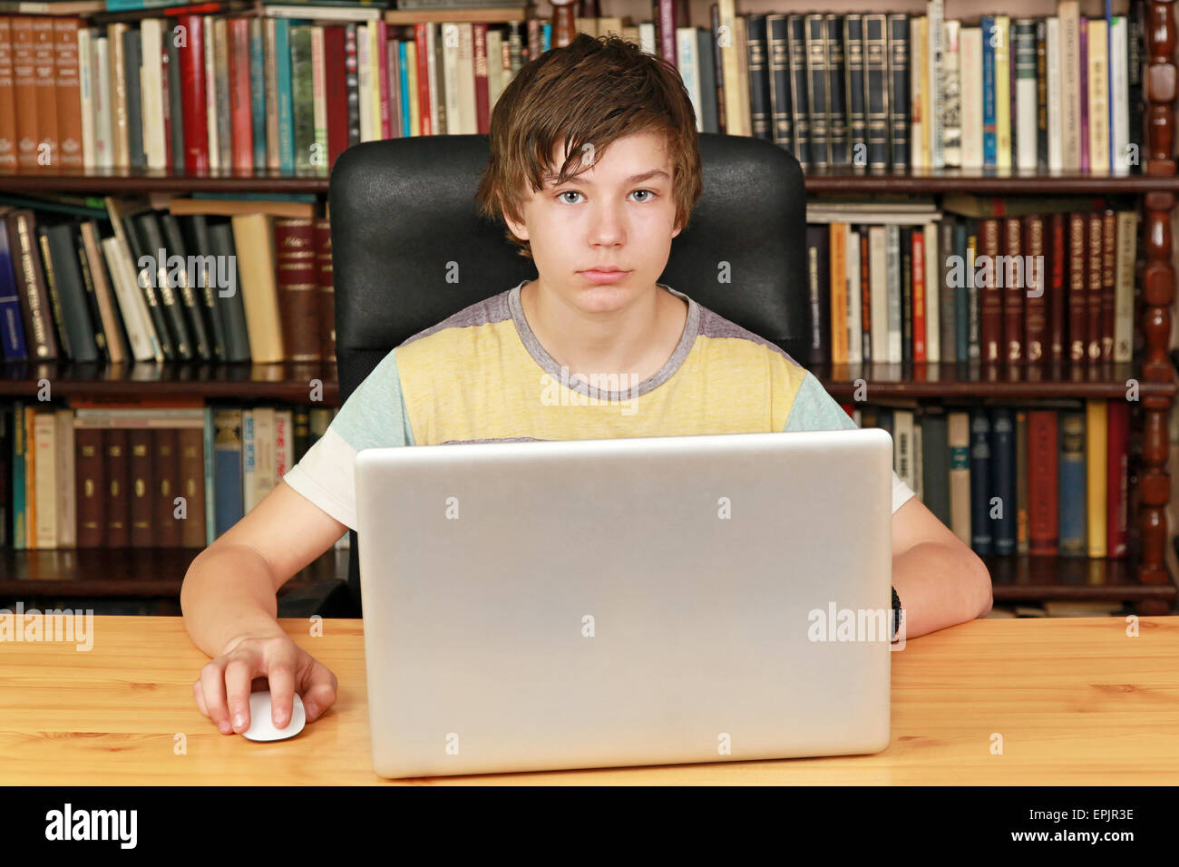 Boy with laptop Stock Photo - Alamy