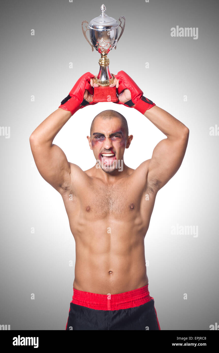 Badly beaten boxer isolated on white Stock Photo - Alamy