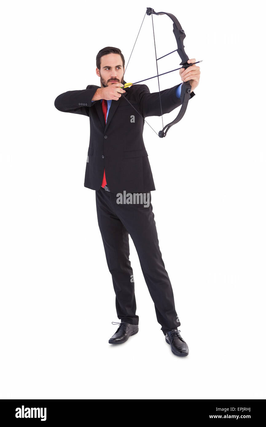 Shooting an arrow into a target Cut Out Stock Images & Pictures - Alamy