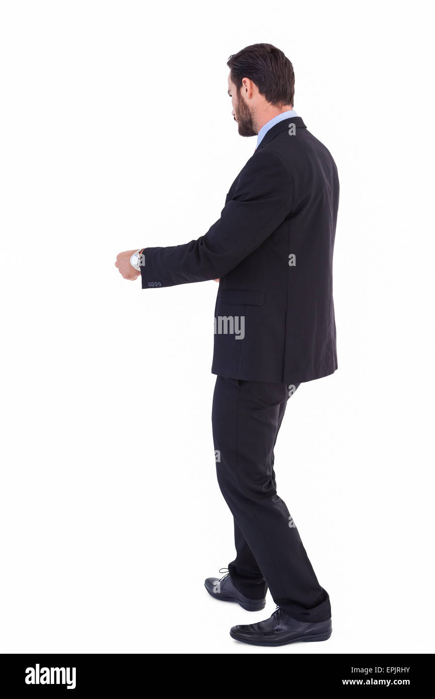 Handsome businessman in suit standing Stock Photo - Alamy