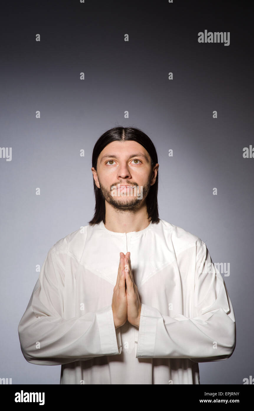 Priest man in religious concept Stock Photo - Alamy