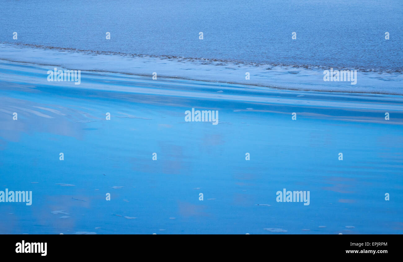 Smooth ripples and waves from ocean Stock Photo - Alamy