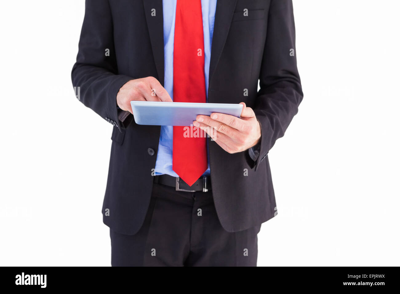 Businessman scrolling on his digital tablet Stock Photo - Alamy