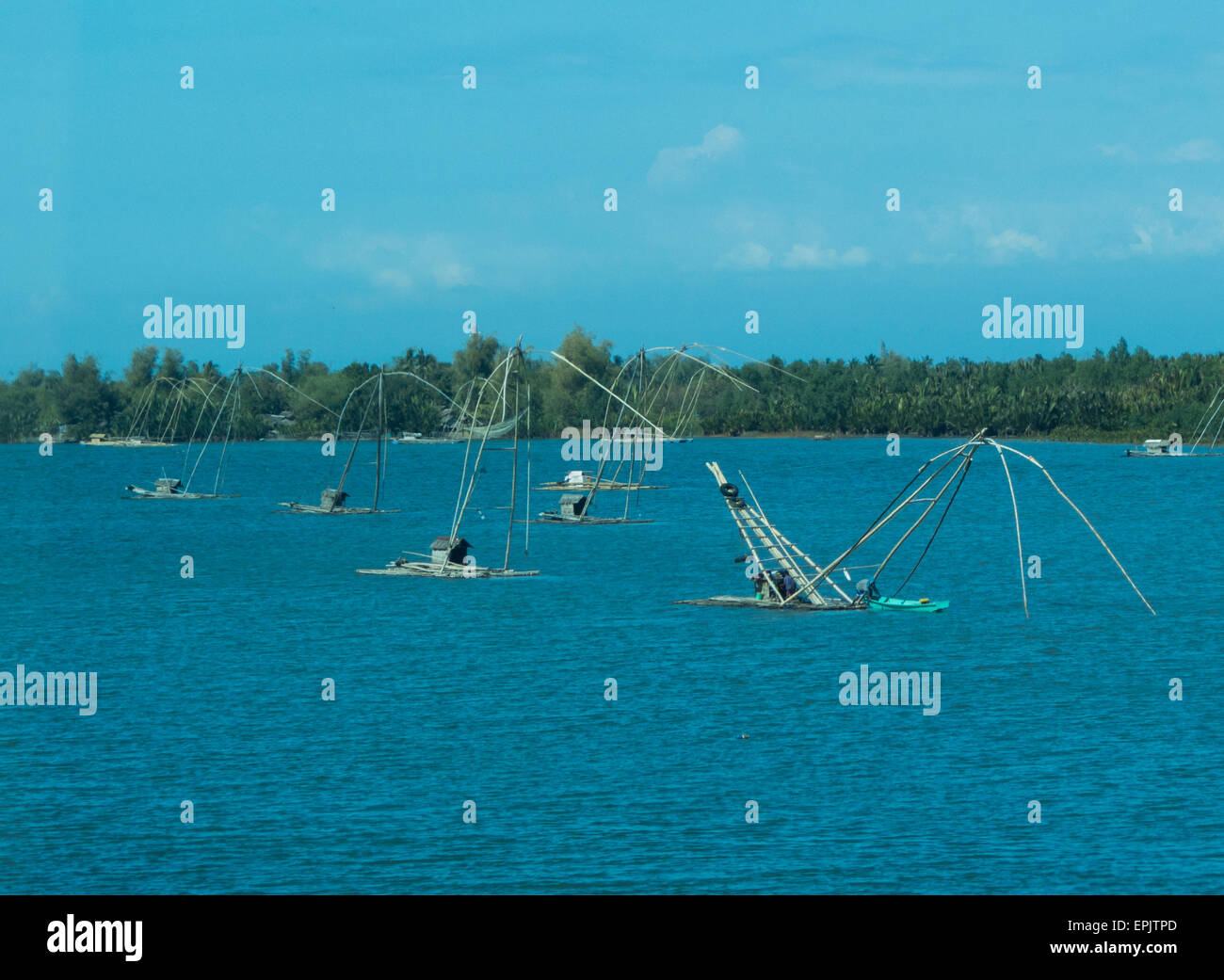 Net Fishing boats on a river in the philippines Stock Photo - Alamy