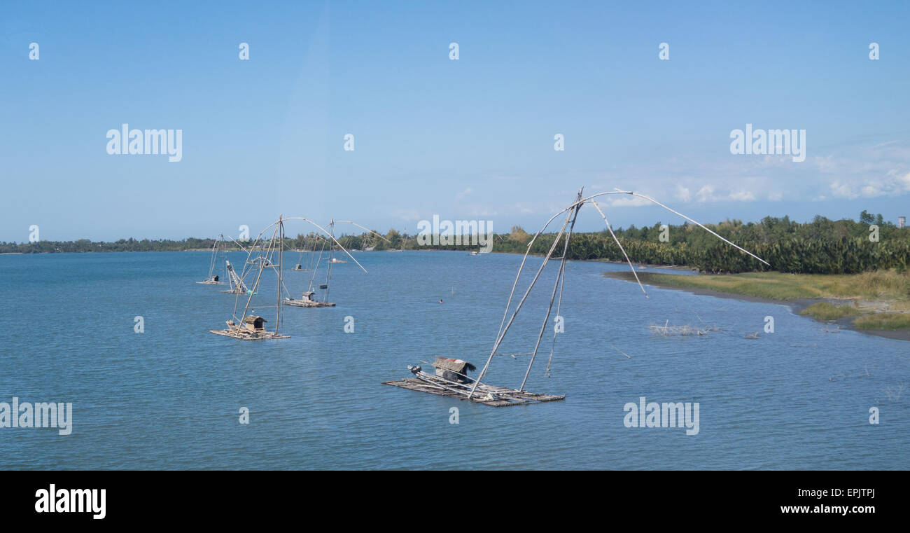Net Fishing boats on a river in the philippines Stock Photo - Alamy