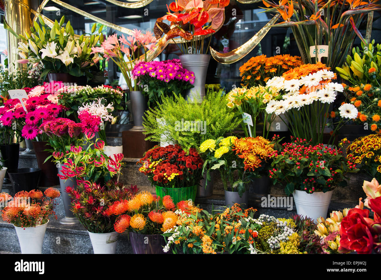 Street flower shop with colourful flowers Stock Photo - Alamy
