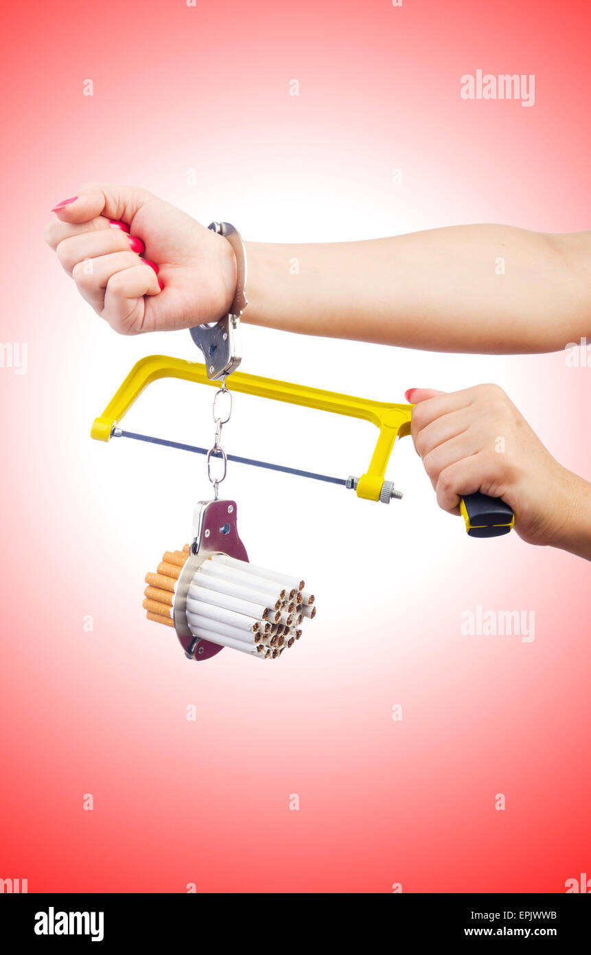Addiction concept cigarettes handcuffs hi-res stock photography and ...