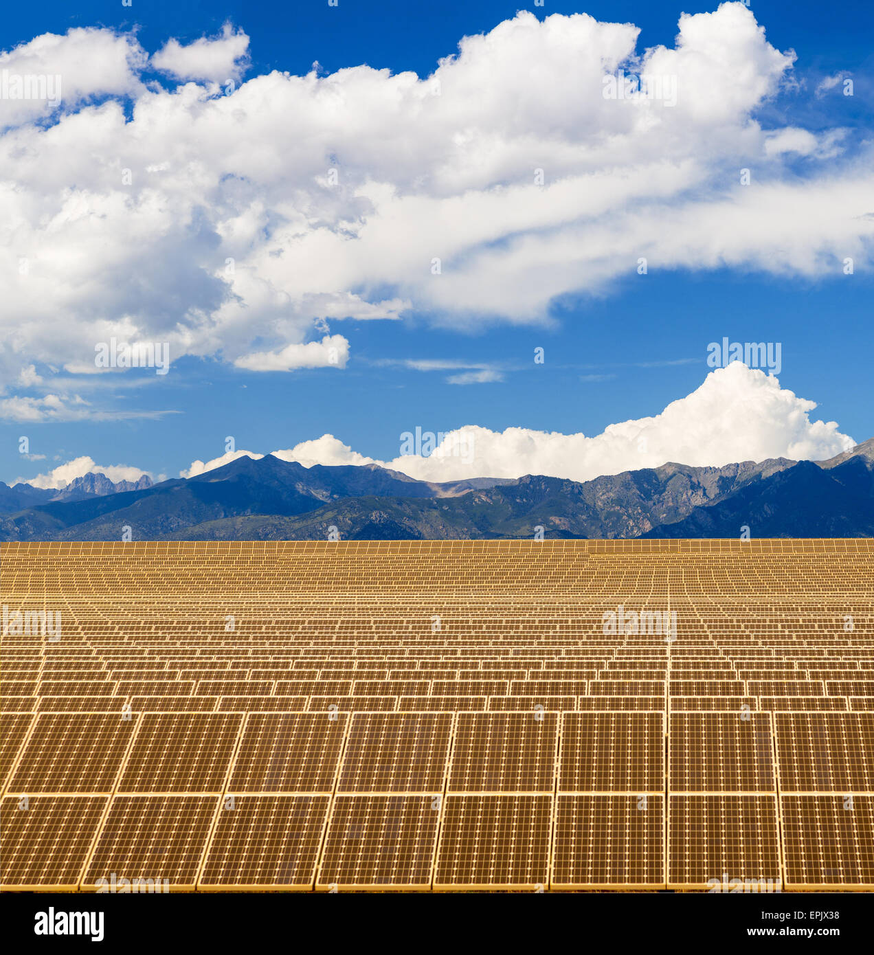 Solar panels in sun under mountains Stock Photo - Alamy