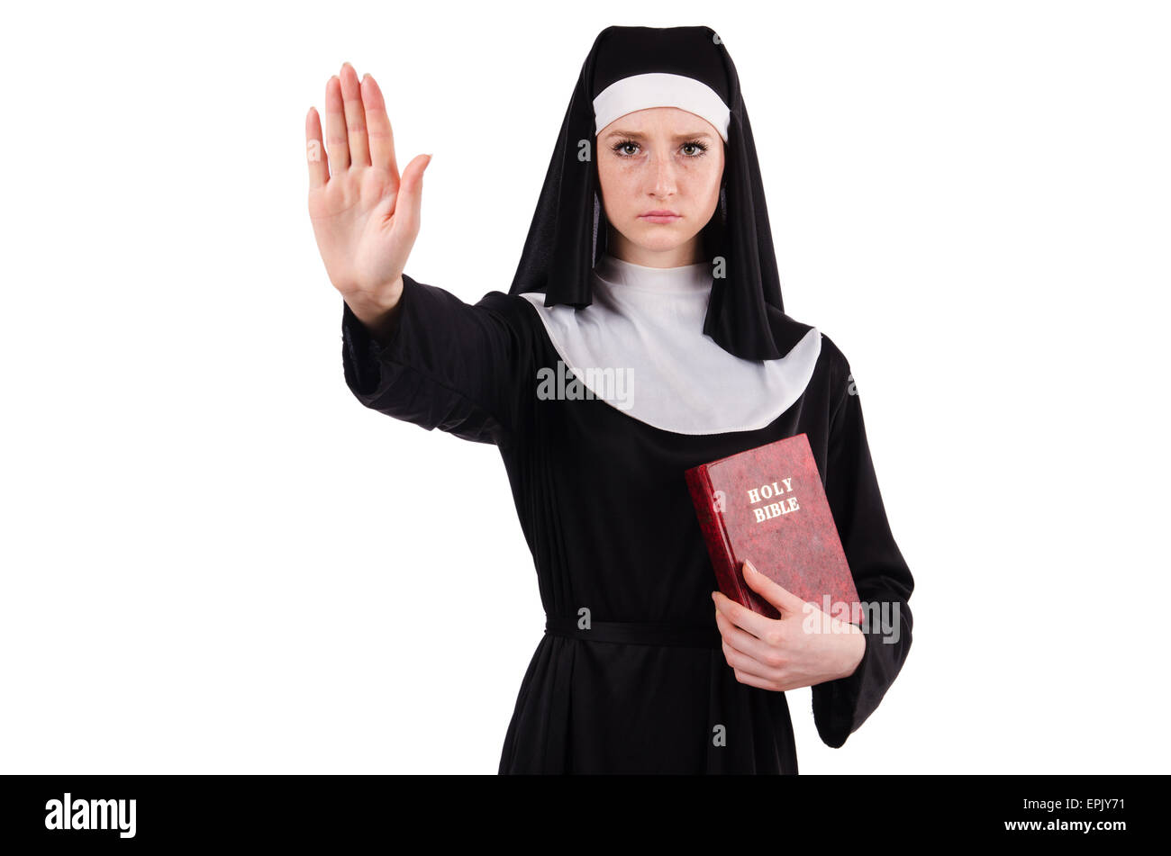 Young nun with bible isolated on white Stock Photo - Alamy
