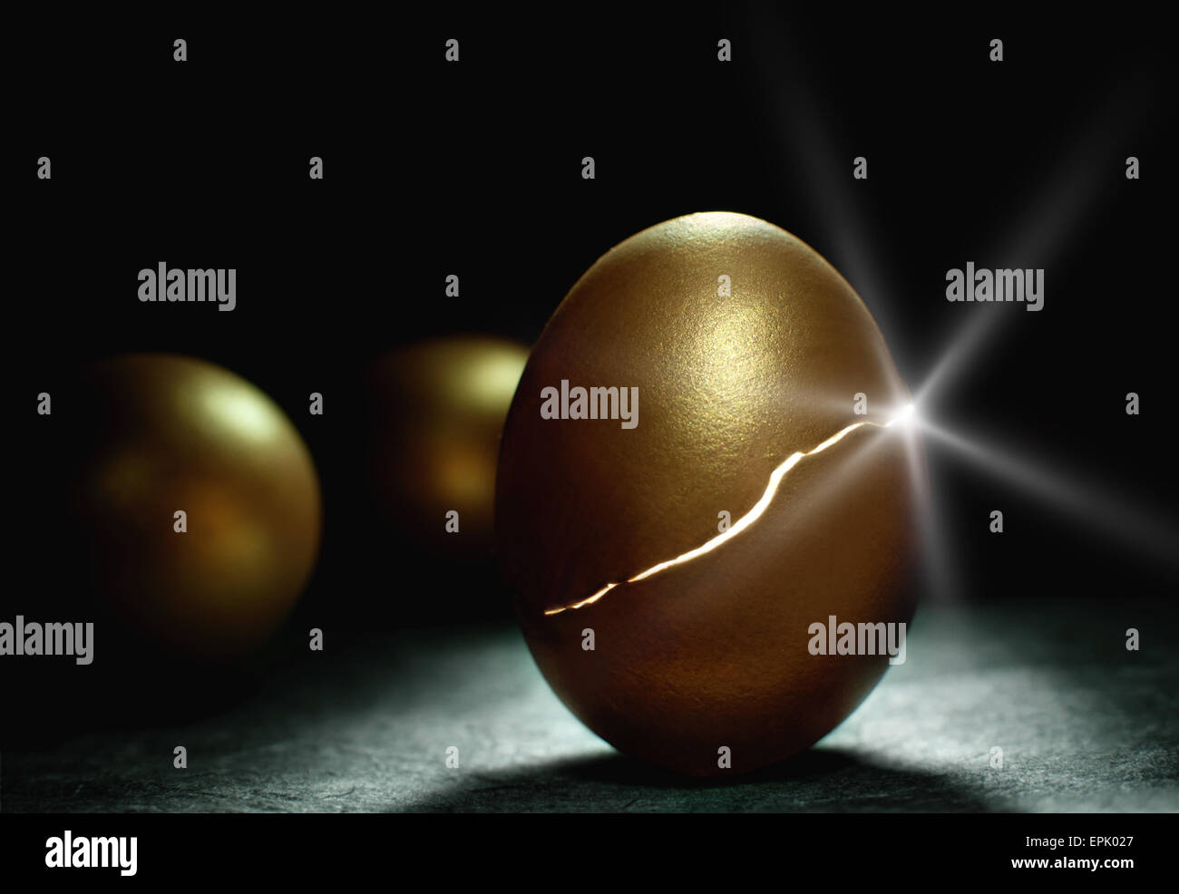 Gold nest egg new life Stock Photo - Alamy