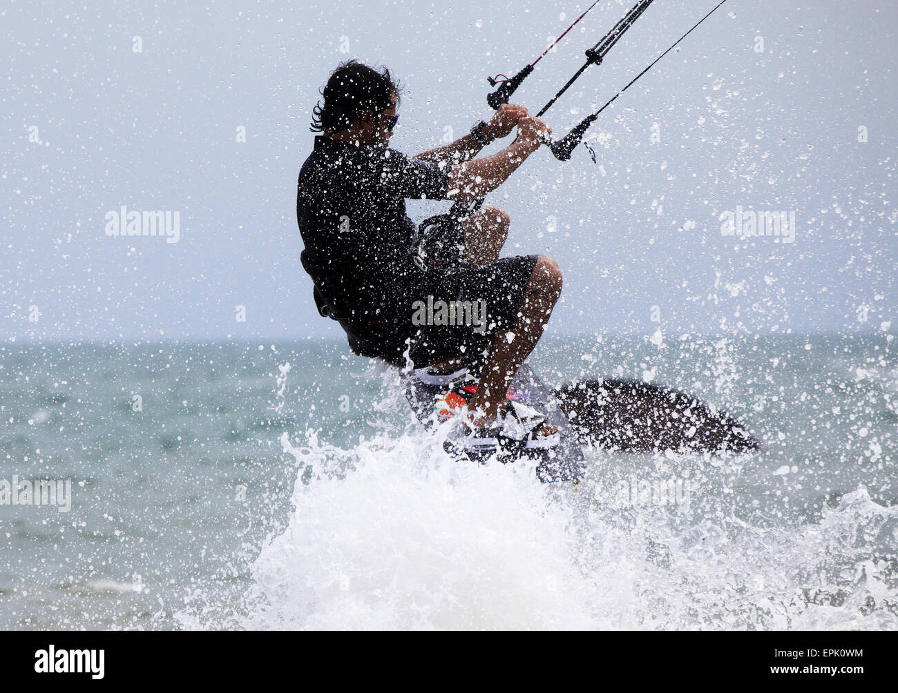 Kitesurfer in action Stock Photo - Alamy