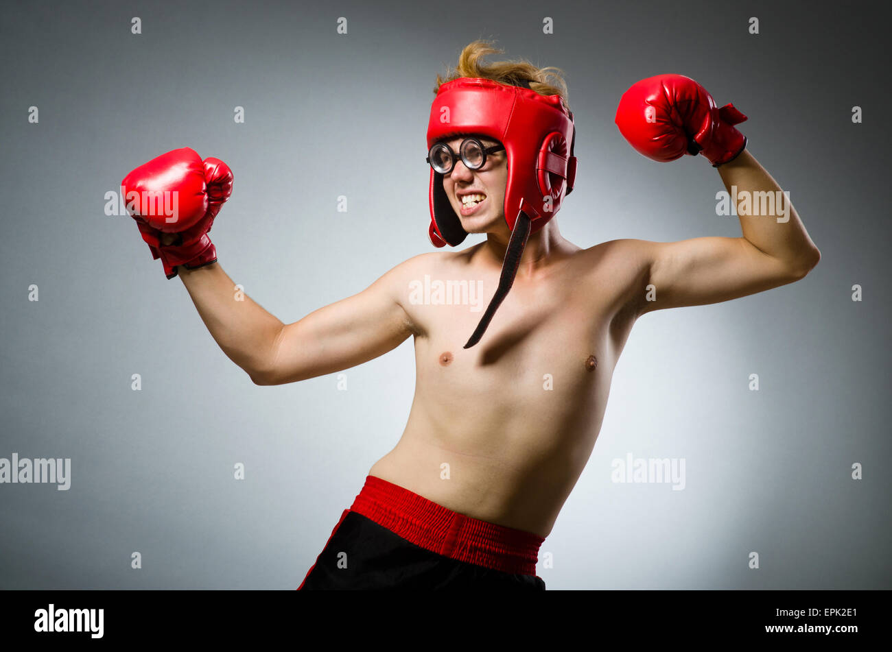 Funny boxer against dark background Stock Photo - Alamy