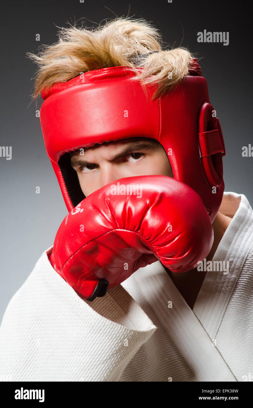 Funny boxer against dark background Stock Photo - Alamy