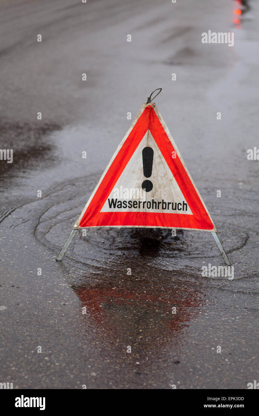 Burst water pipe Stock Photo - Alamy