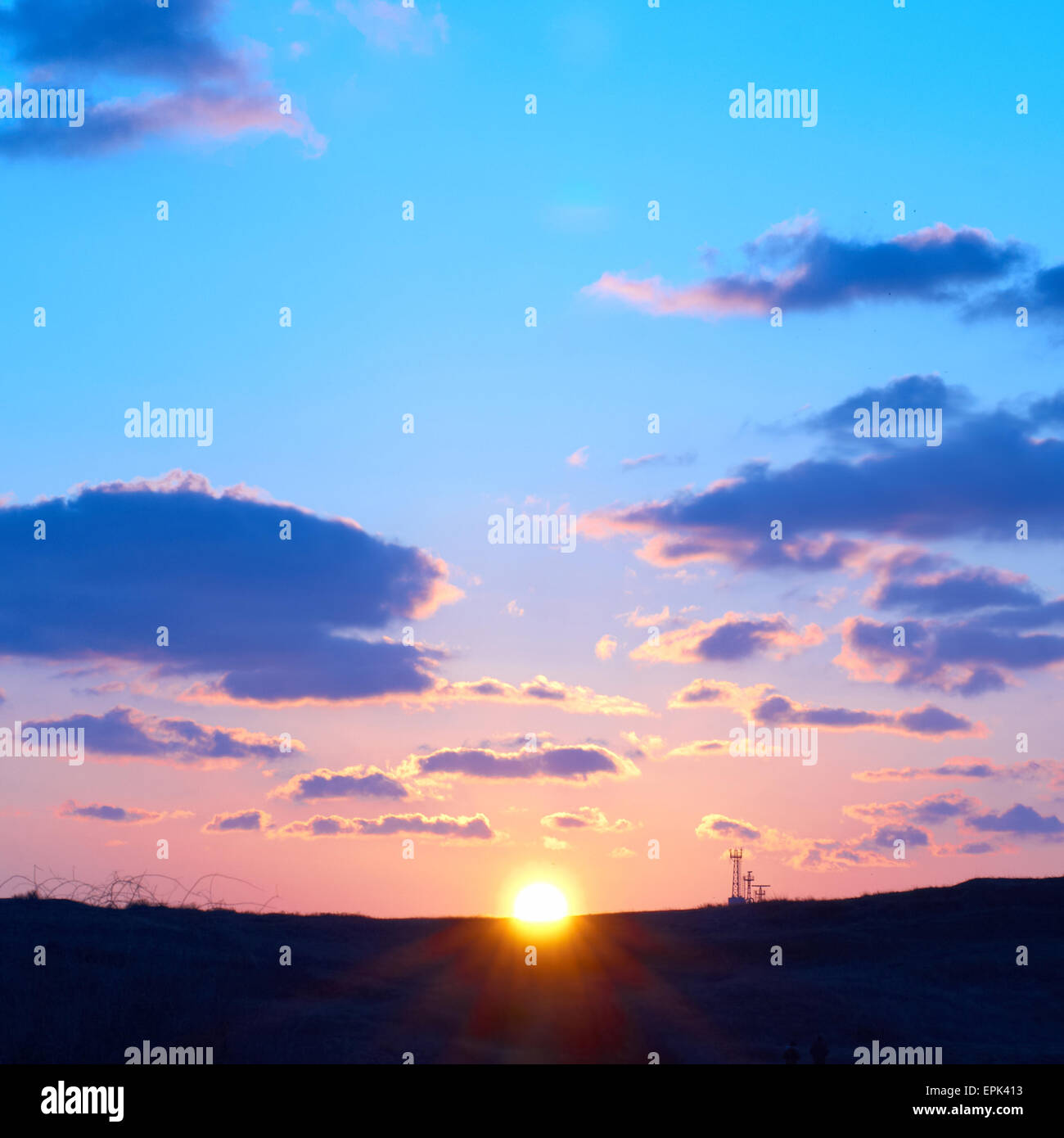 Sunset above the land Stock Photo - Alamy