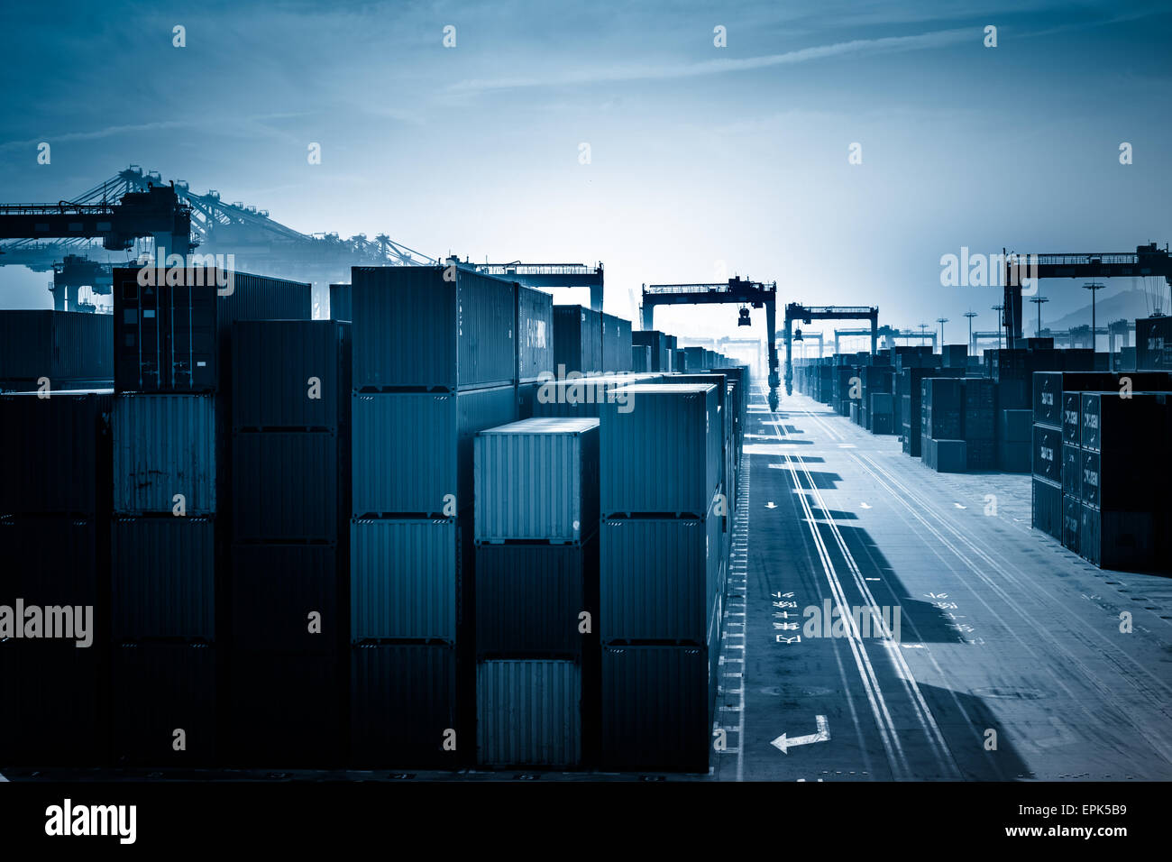 Container Yard and Crane Stock Photo - Alamy