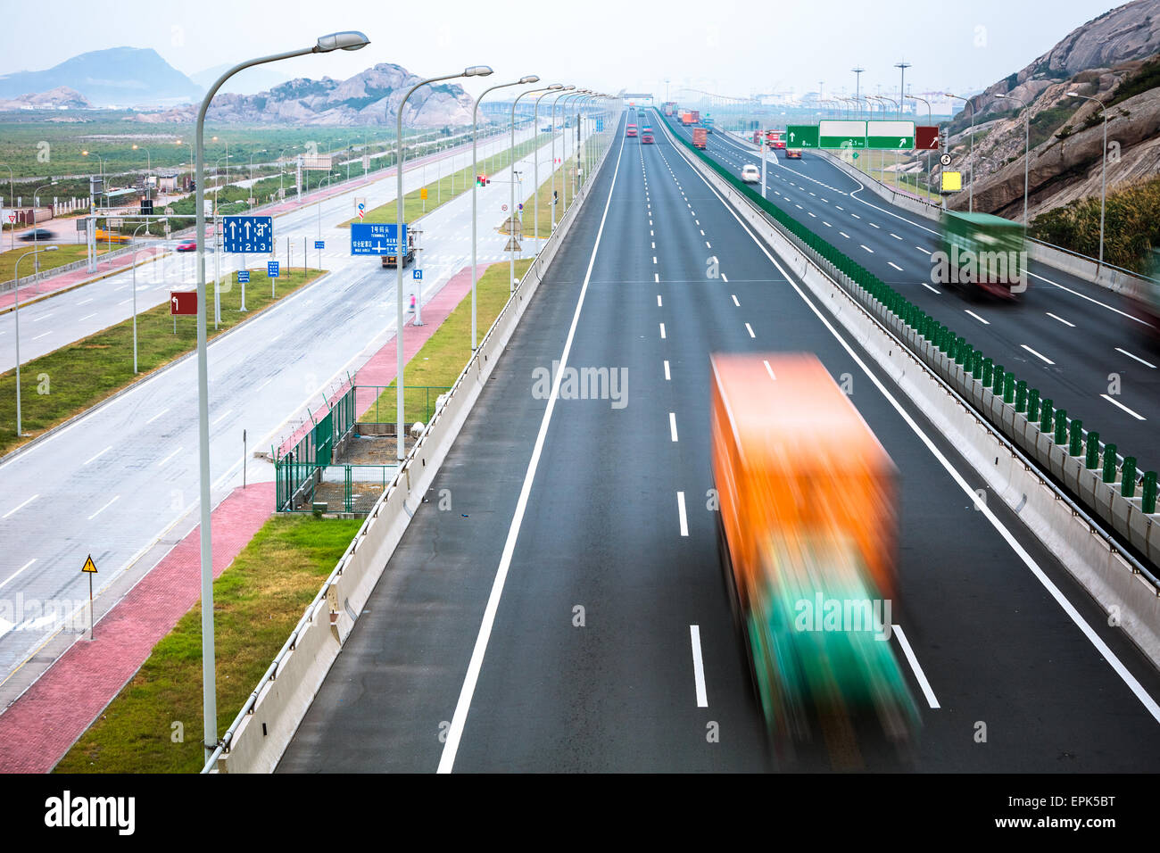 motion trucks on the freeway Stock Photo - Alamy