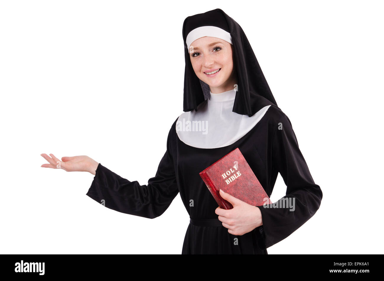 Young nun with bible isolated on white Stock Photo - Alamy
