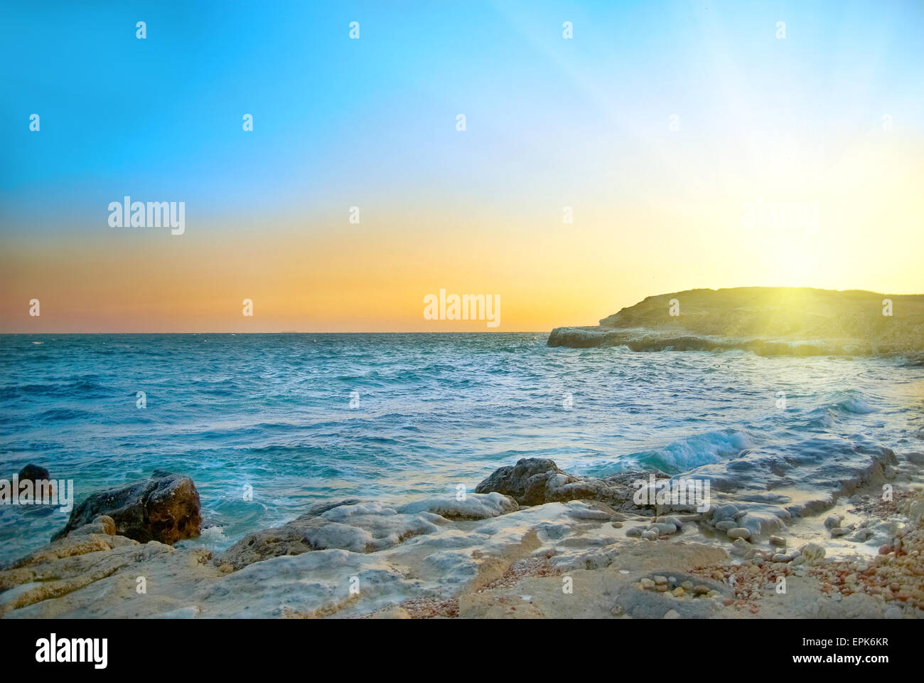 Sunset above the winter sea Stock Photo - Alamy
