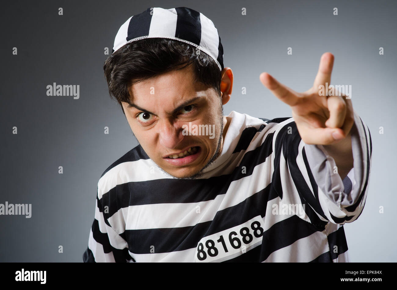 Prison inmate in funny concept Stock Photo - Alamy