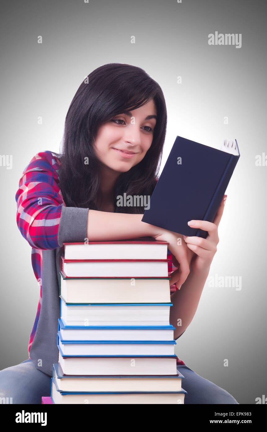 Girl student with books on white Stock Photo - Alamy