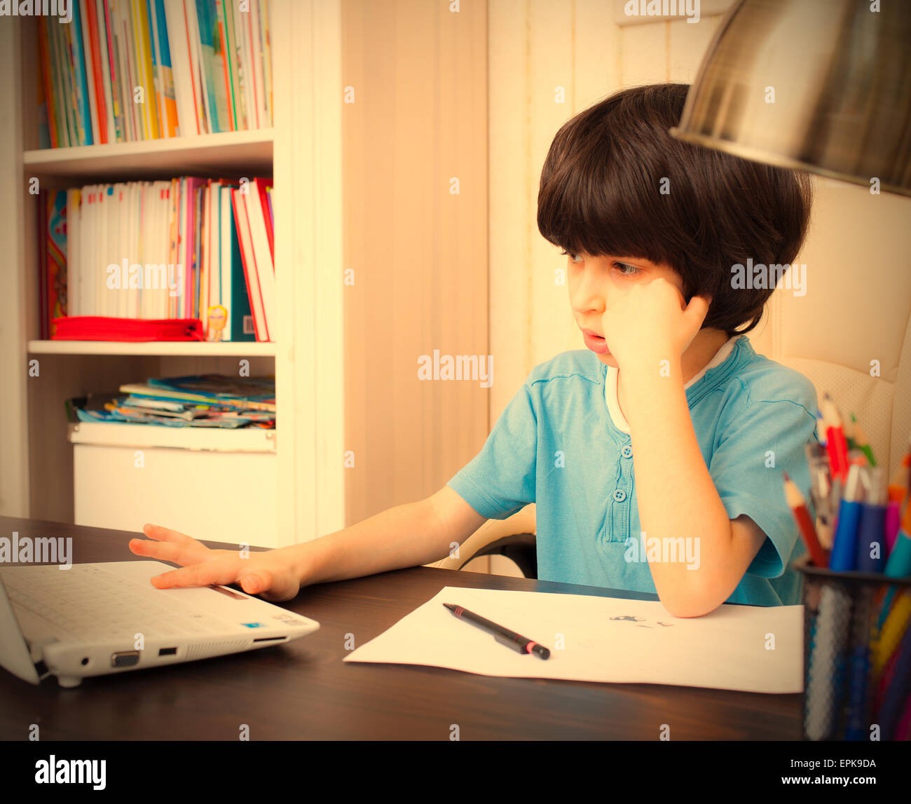 boy doing homework Stock Photo - Alamy