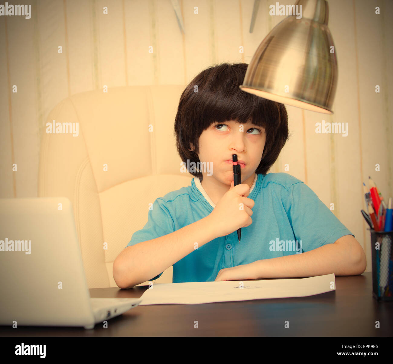 student thinks about homework Stock Photo - Alamy