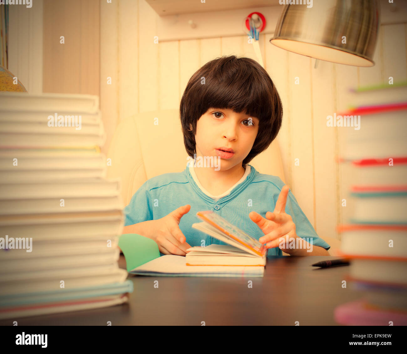 child reading a book Stock Photo - Alamy