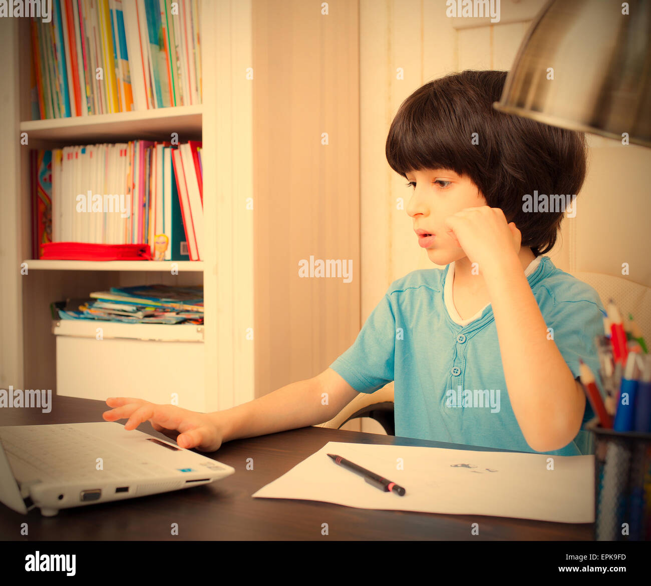 child doing homework Stock Photo - Alamy
