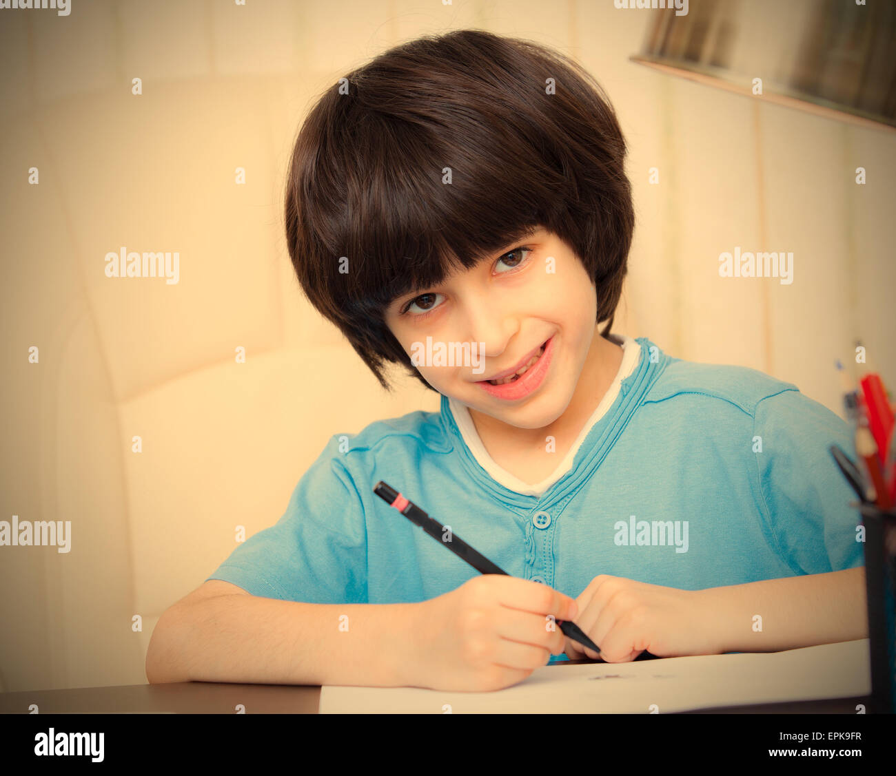 child doing homework with computer, portrait Stock Photo - Alamy