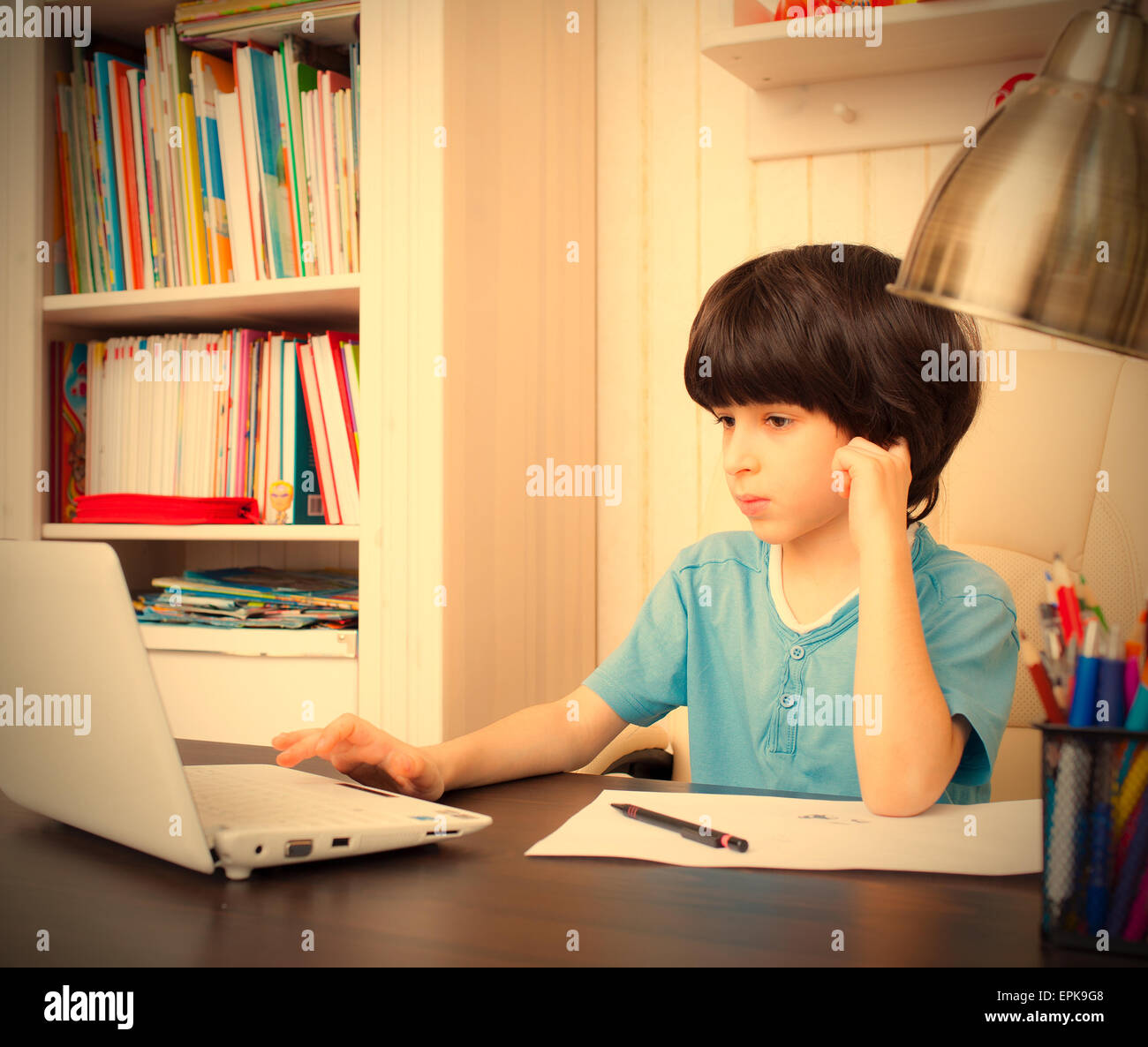 boy doing homework, portrait Stock Photo - Alamy