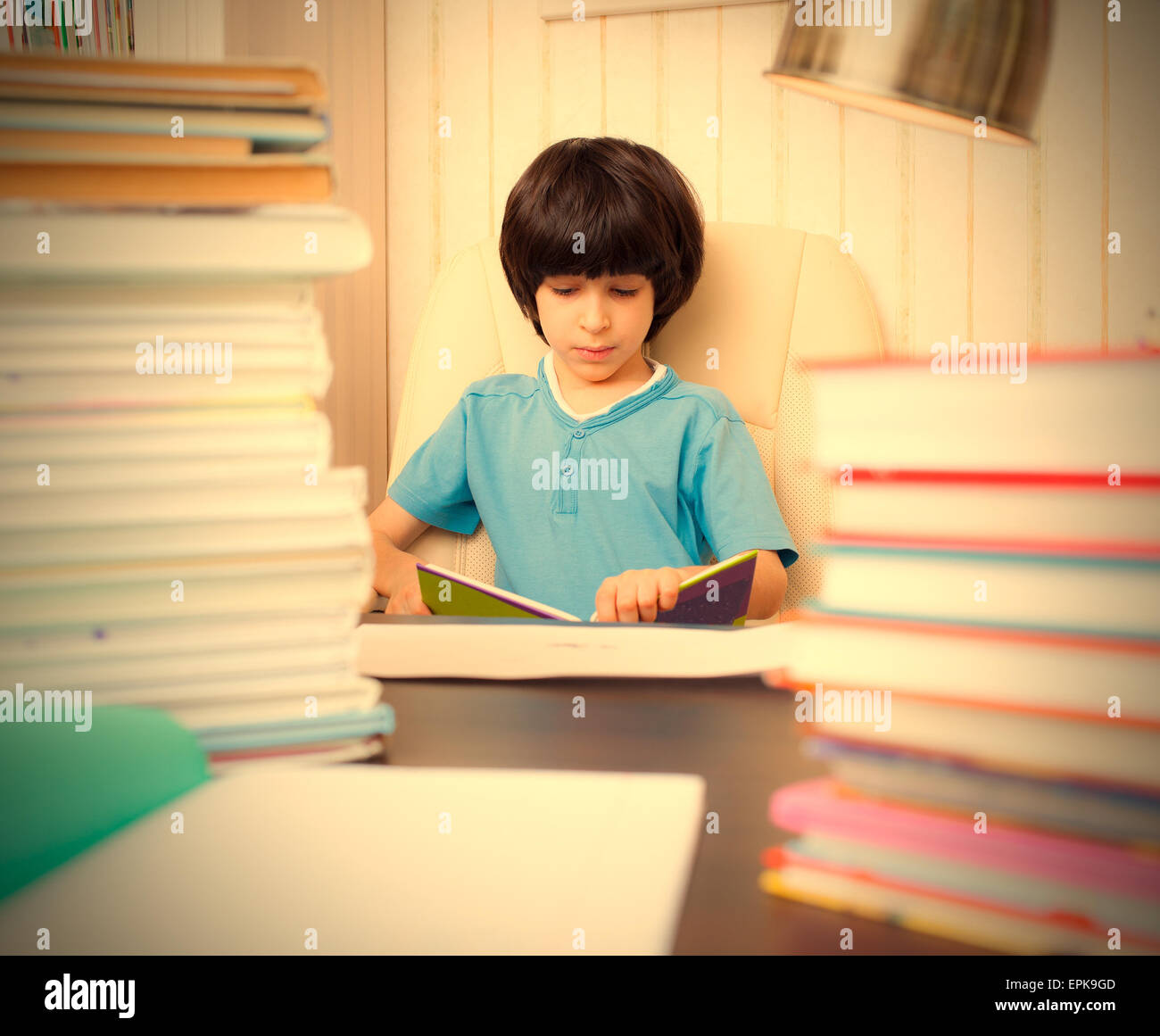 boy reading a book Stock Photo - Alamy