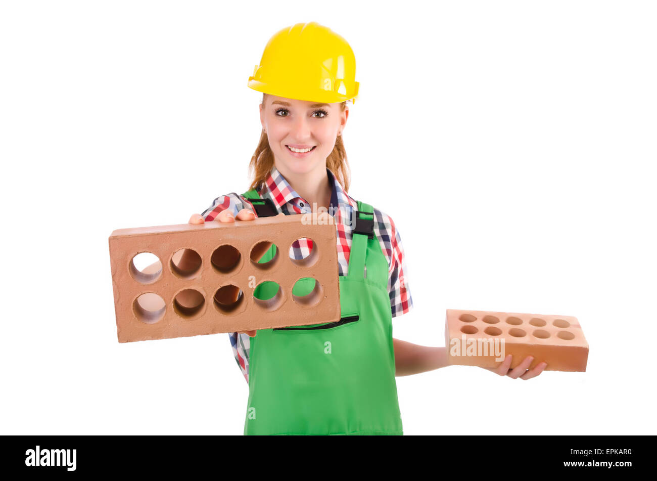 Woman with bricks isolated on white Stock Photo - Alamy
