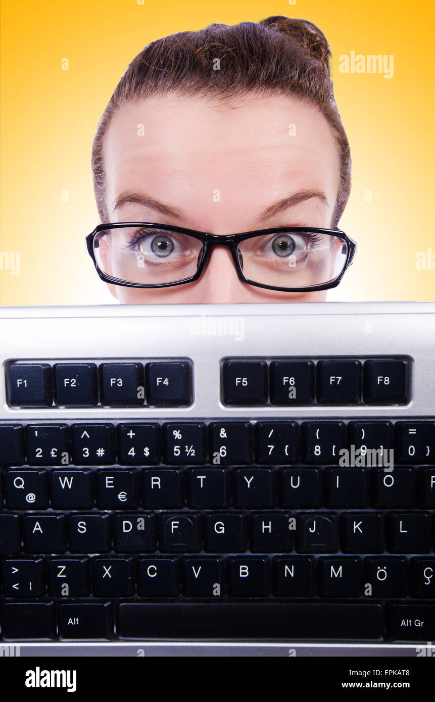 Nerd businessman with computer keyboard on white Stock Photo - Alamy