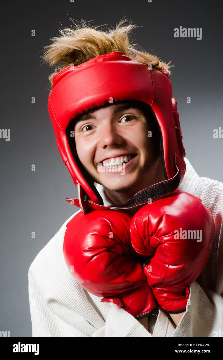 Funny boxer against dark background Stock Photo - Alamy