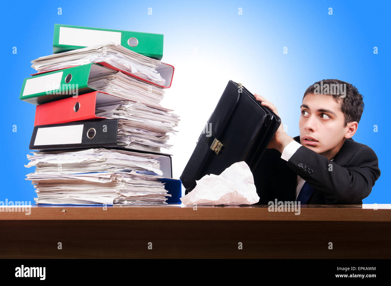 Young busy businessman at his desk Stock Photo - Alamy