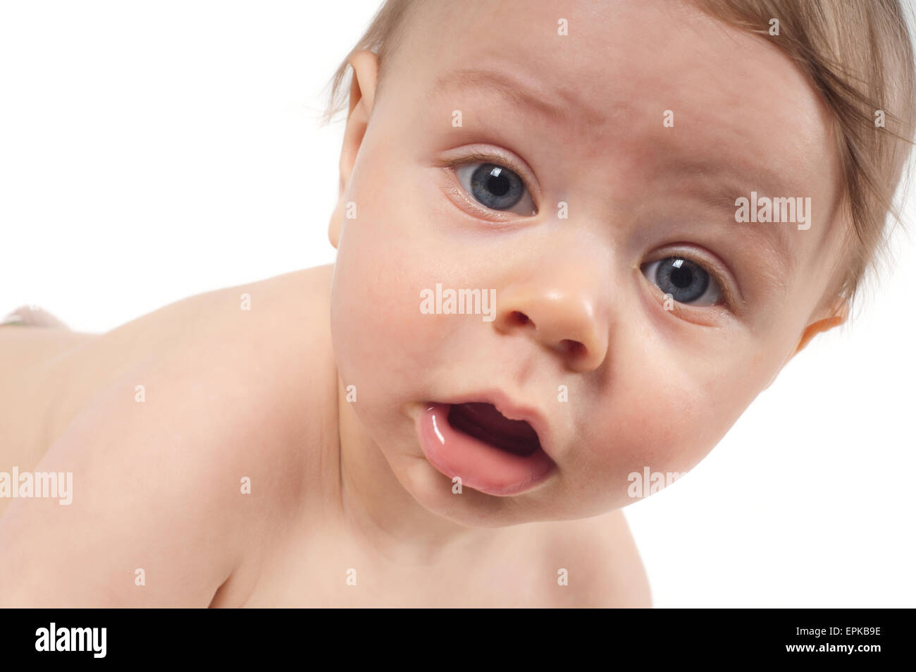 Serious baby watching on you Stock Photo - Alamy