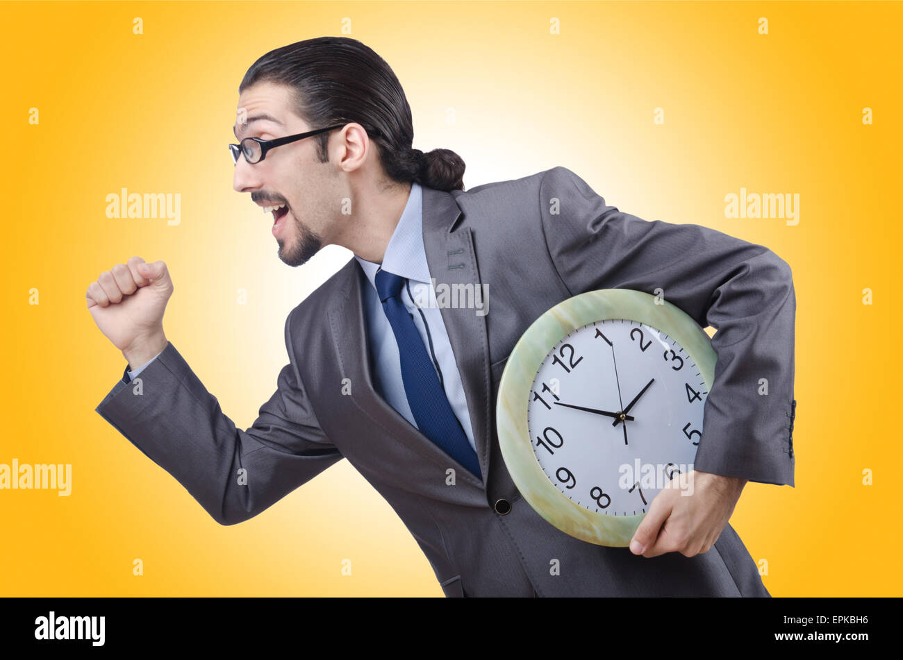 Man with clock isolated on white Stock Photo - Alamy