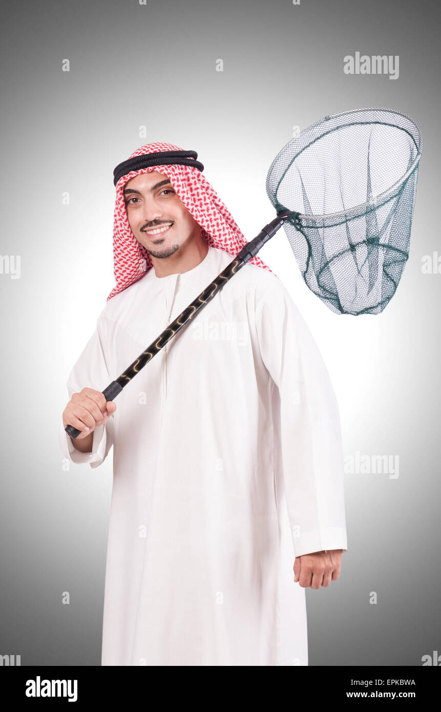 Arab businessman with catching net on white Stock Photo - Alamy