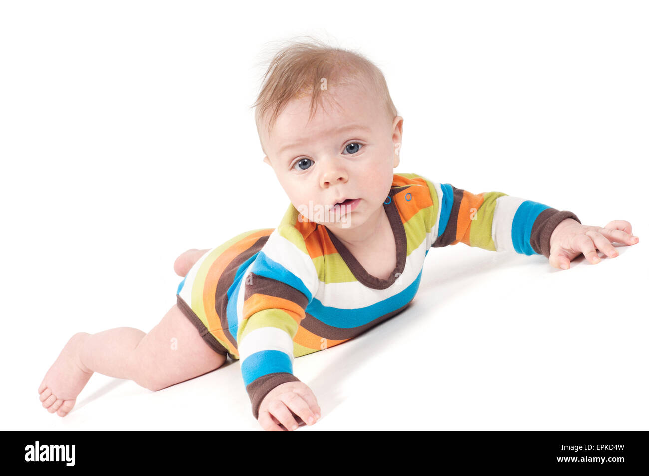 Small baby in striped clothes Stock Photo - Alamy