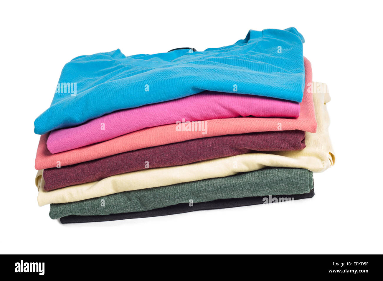 Multicolored clothes in pile Stock Photo - Alamy