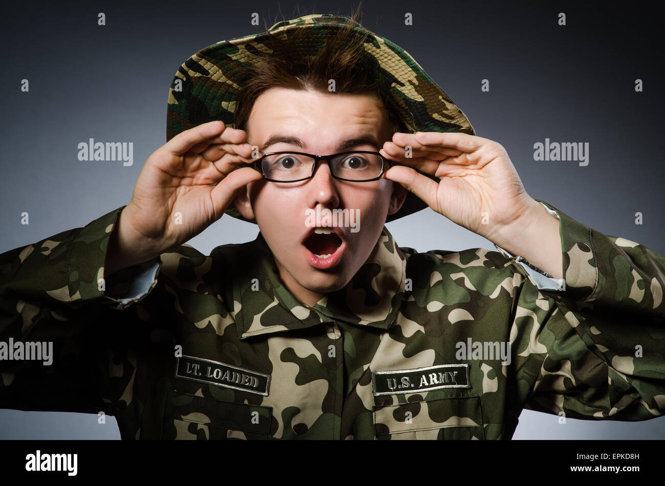 Funny soldier in military concept Stock Photo - Alamy
