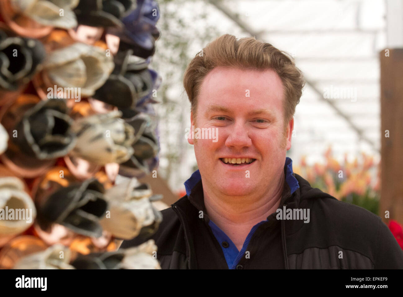 London UK. 19th May 2015. Artist Paul Cummins with his 8metre tall ...