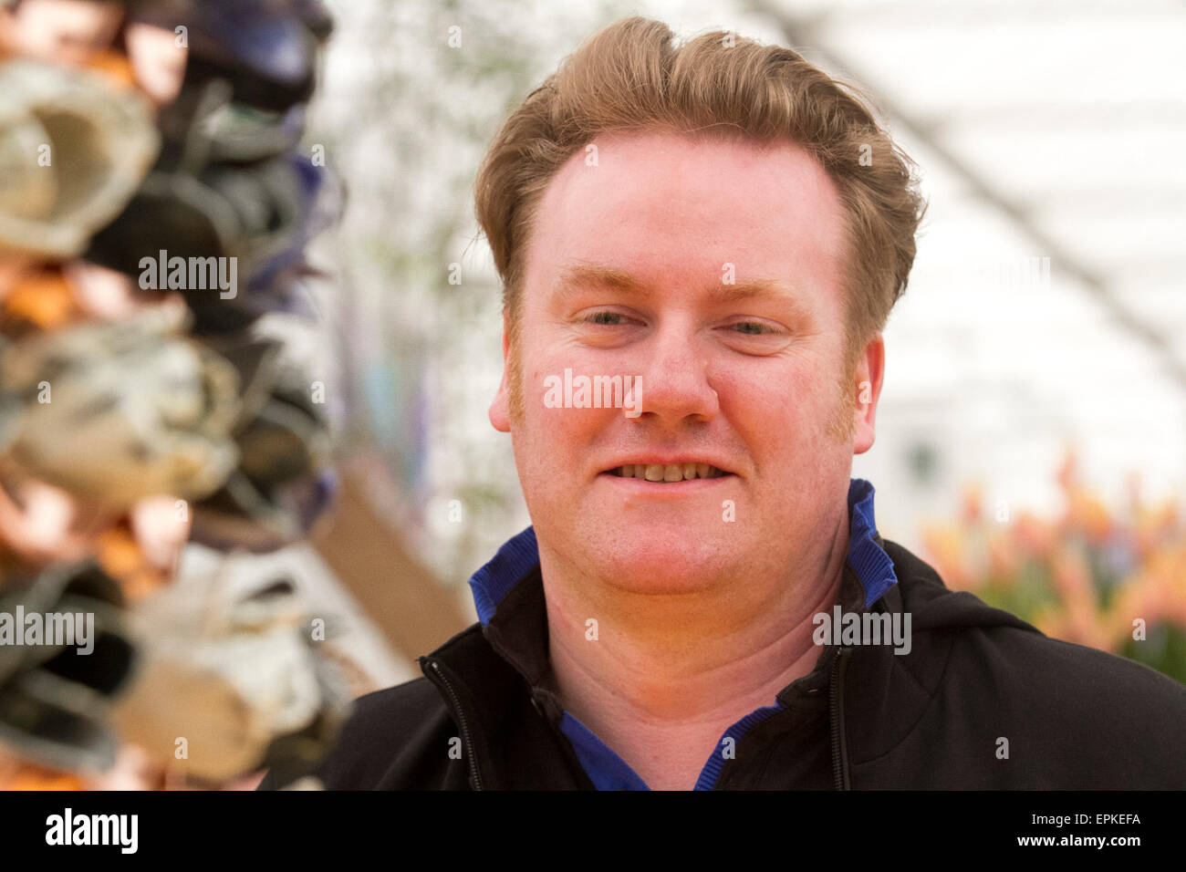 London UK. 19th May 2015. Artist Paul Cummins with his 8metre tall ...