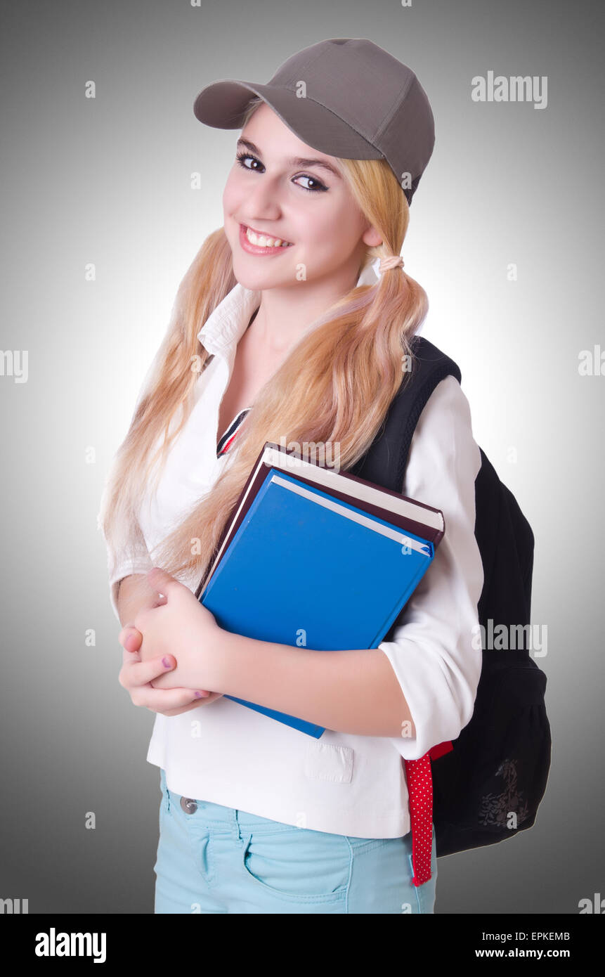 Girl student with books on white Stock Photo - Alamy