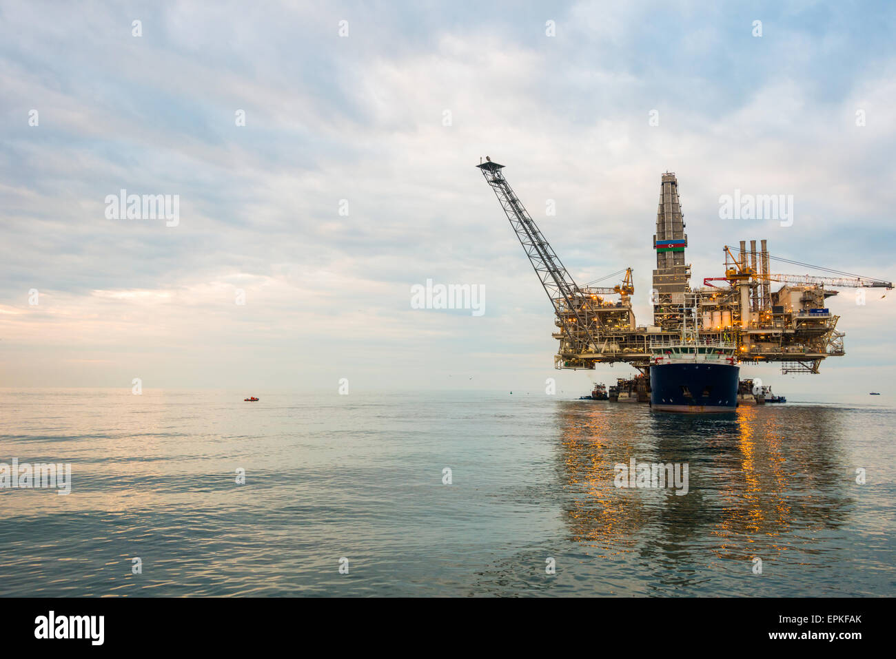 Oil rig platform in the calm sea Stock Photo - Alamy