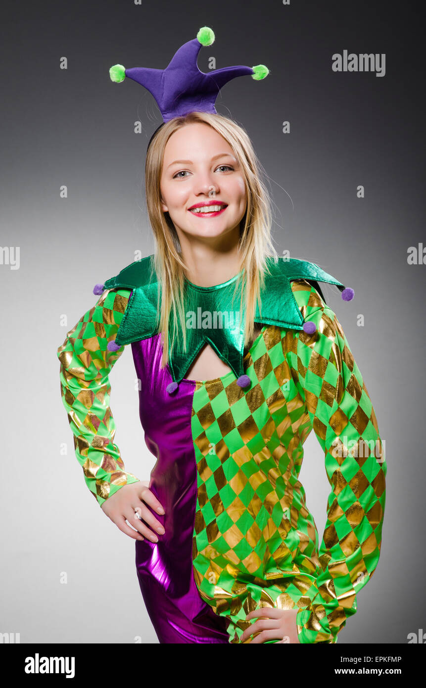 Funny clown in colourful costume Stock Photo - Alamy