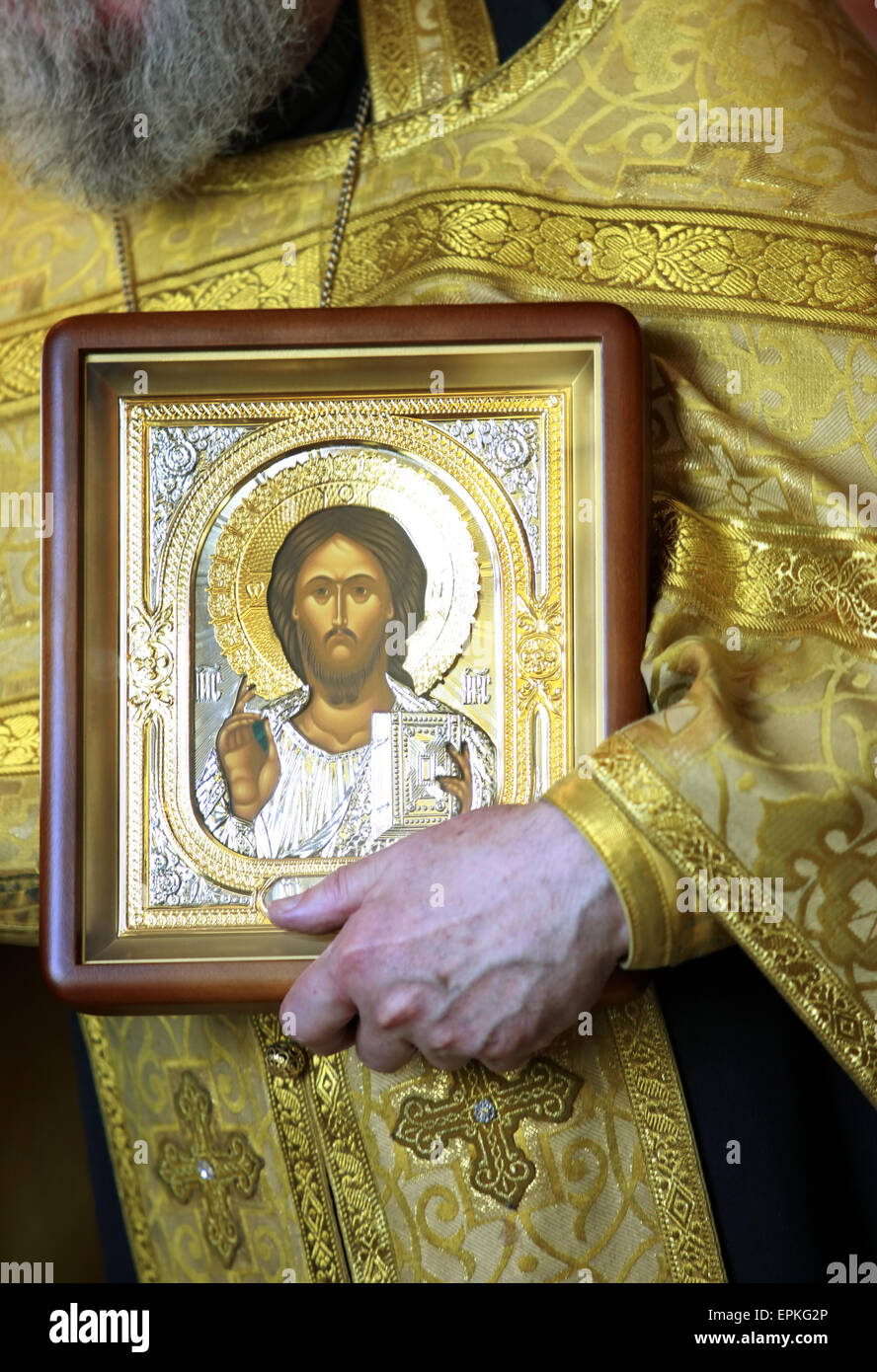 Priest with icon Jesus Christ Stock Photo - Alamy
